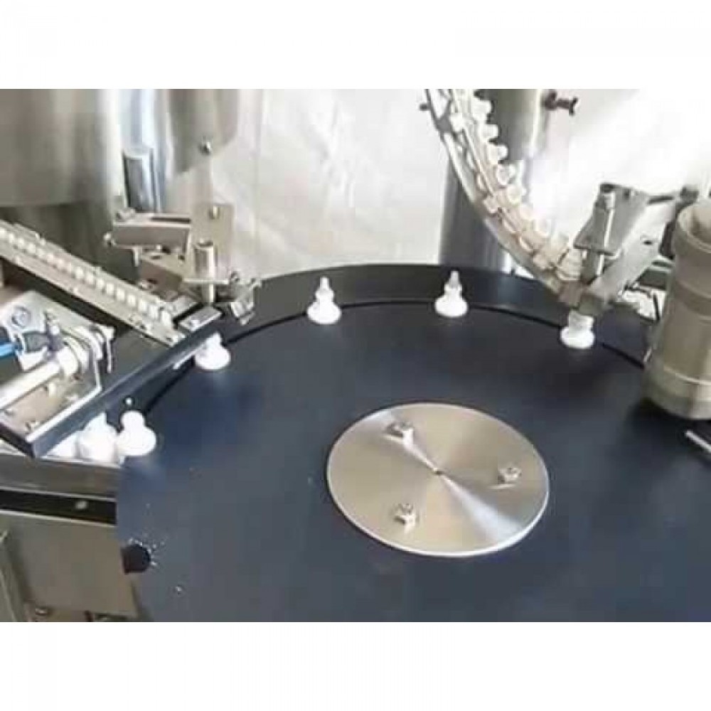 Automatic Eye Drop Filling Plugging & Outer Capping Machine - Shivoham Pharma Machines LLP Ahmedabad